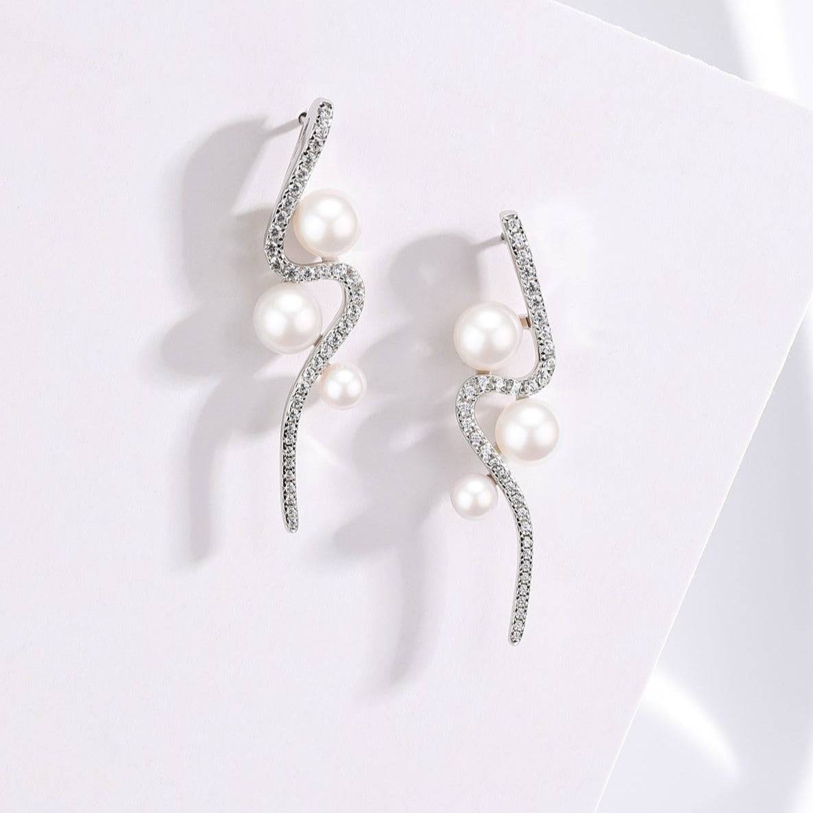 Elegant Curve 925 Silver & Freshwater Pearl Studs | House Of Pearls